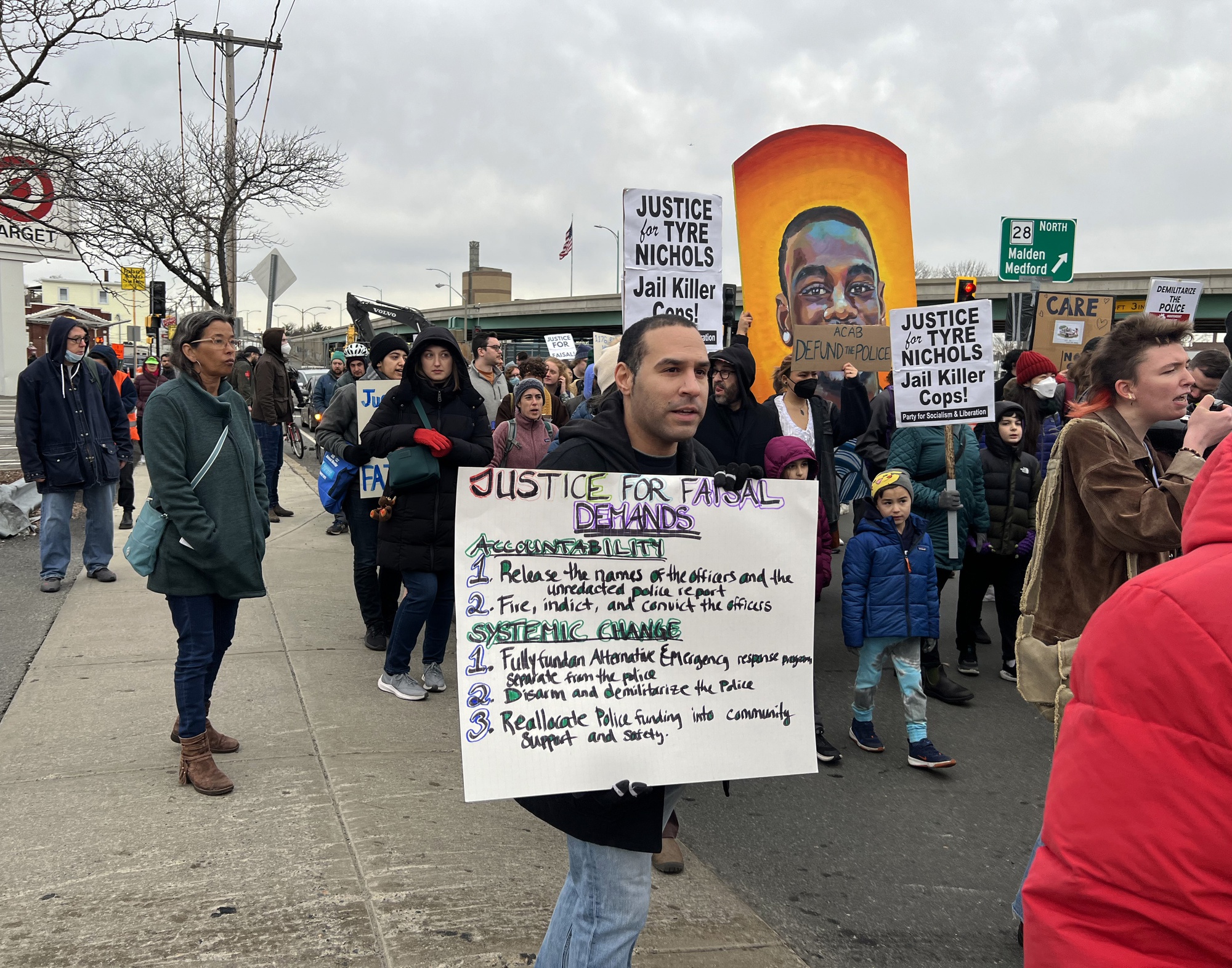 Demonstrators March to Cambridge Police Station to Demand ...