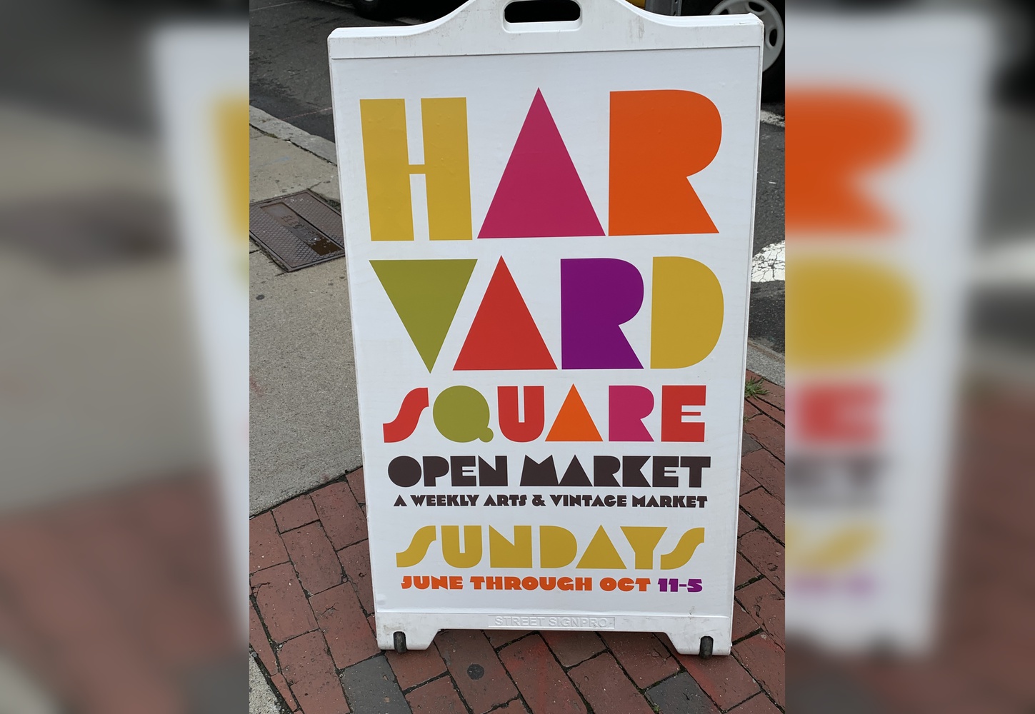 Harvard Square Open Market sign | Arts | The Harvard Crimson