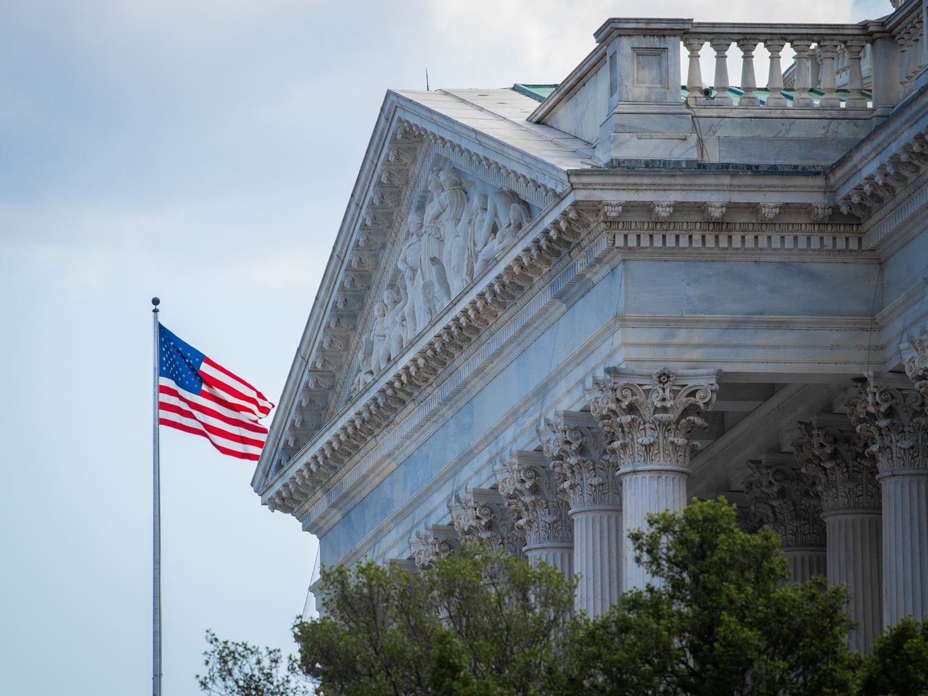 U.S. Capitol Building Flanked By American Flag | News | The Harvard Crimson