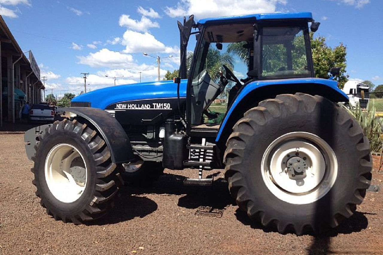 Trator New Holland TM 150 02/02 - RBR Intermediação e Agenciamento ...