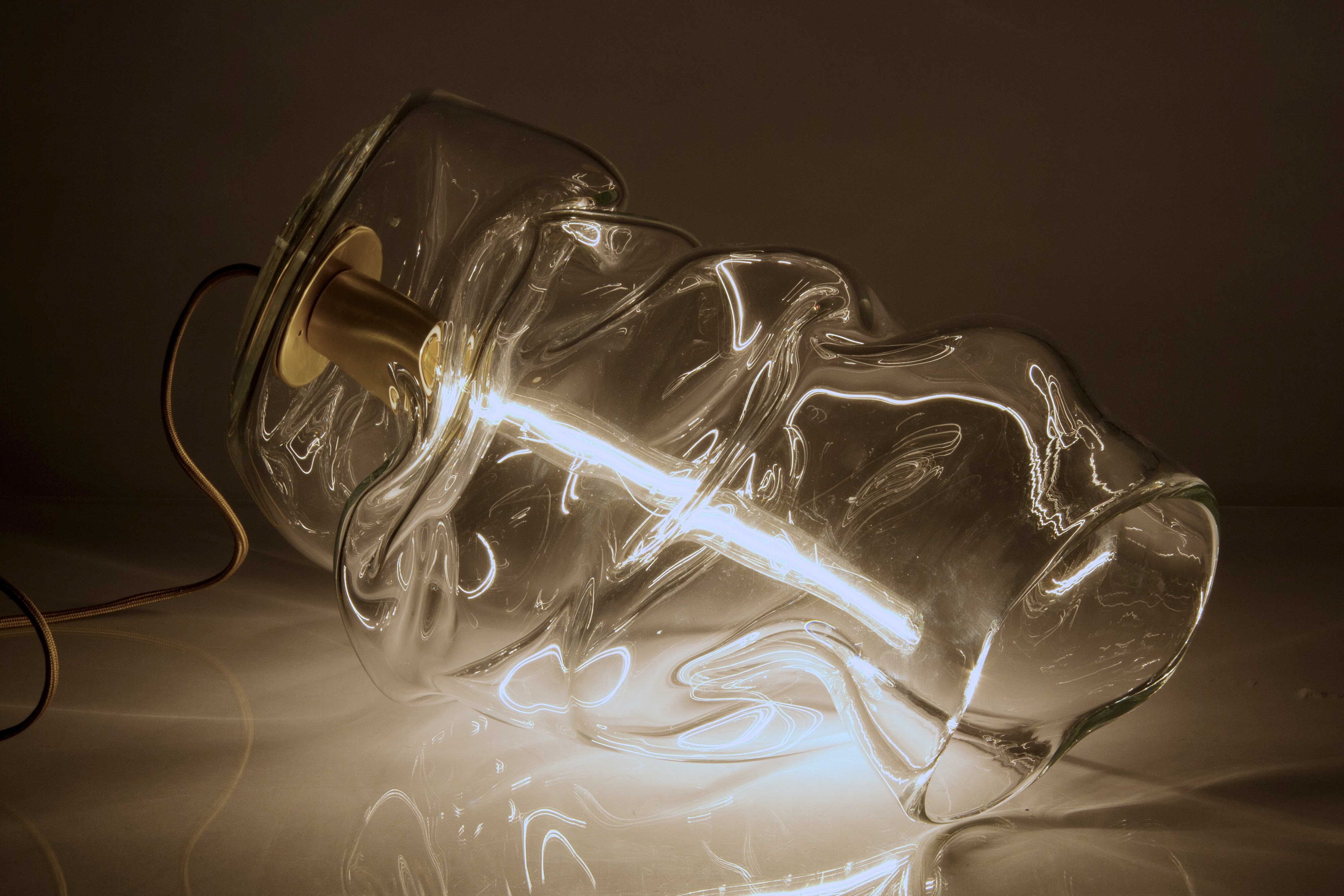 OPENING: Glass lighting and sculpture installation at NYC apparel store ...