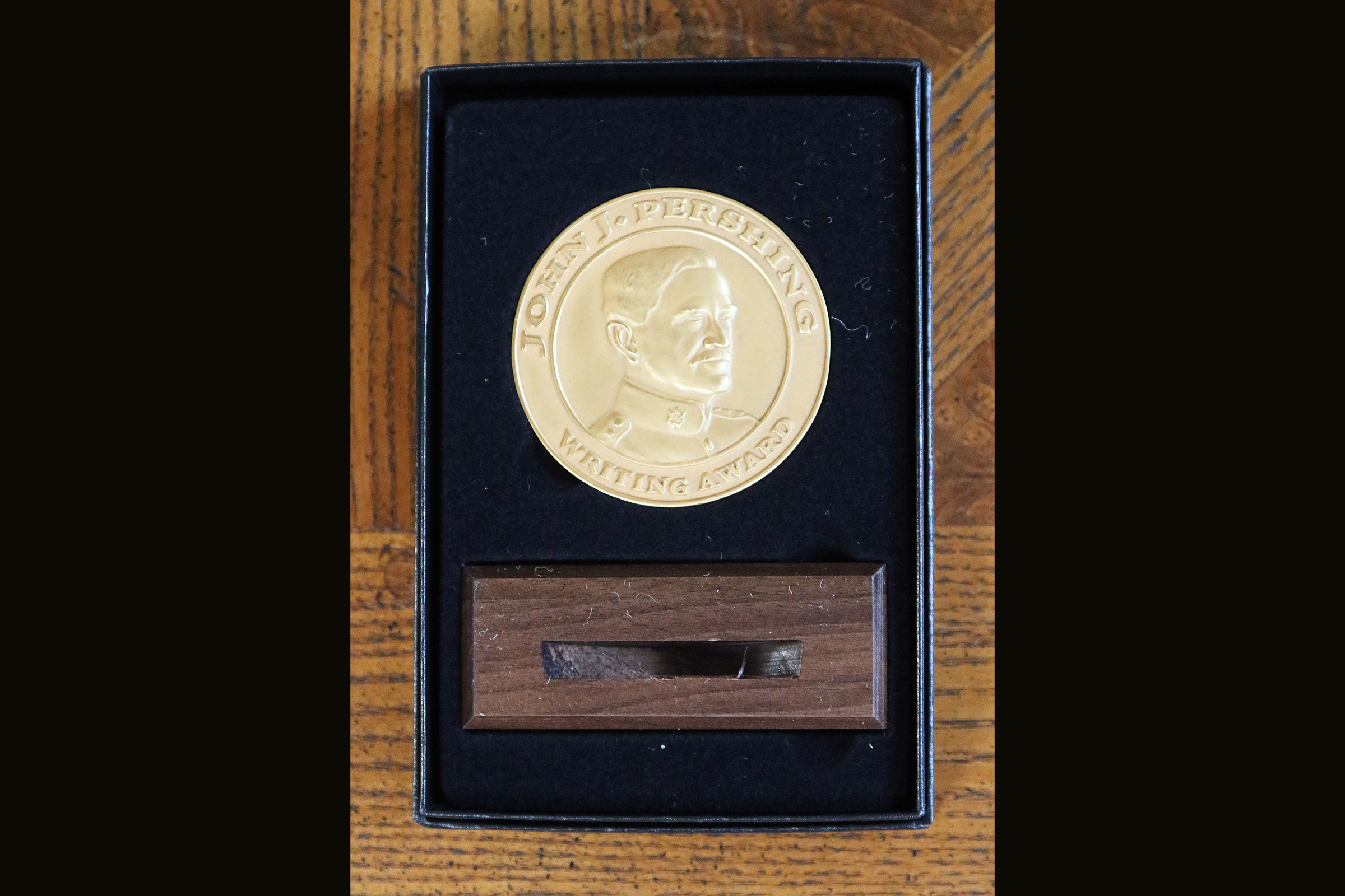 Top cadets receive medals for their reflective essays during Pershing ...