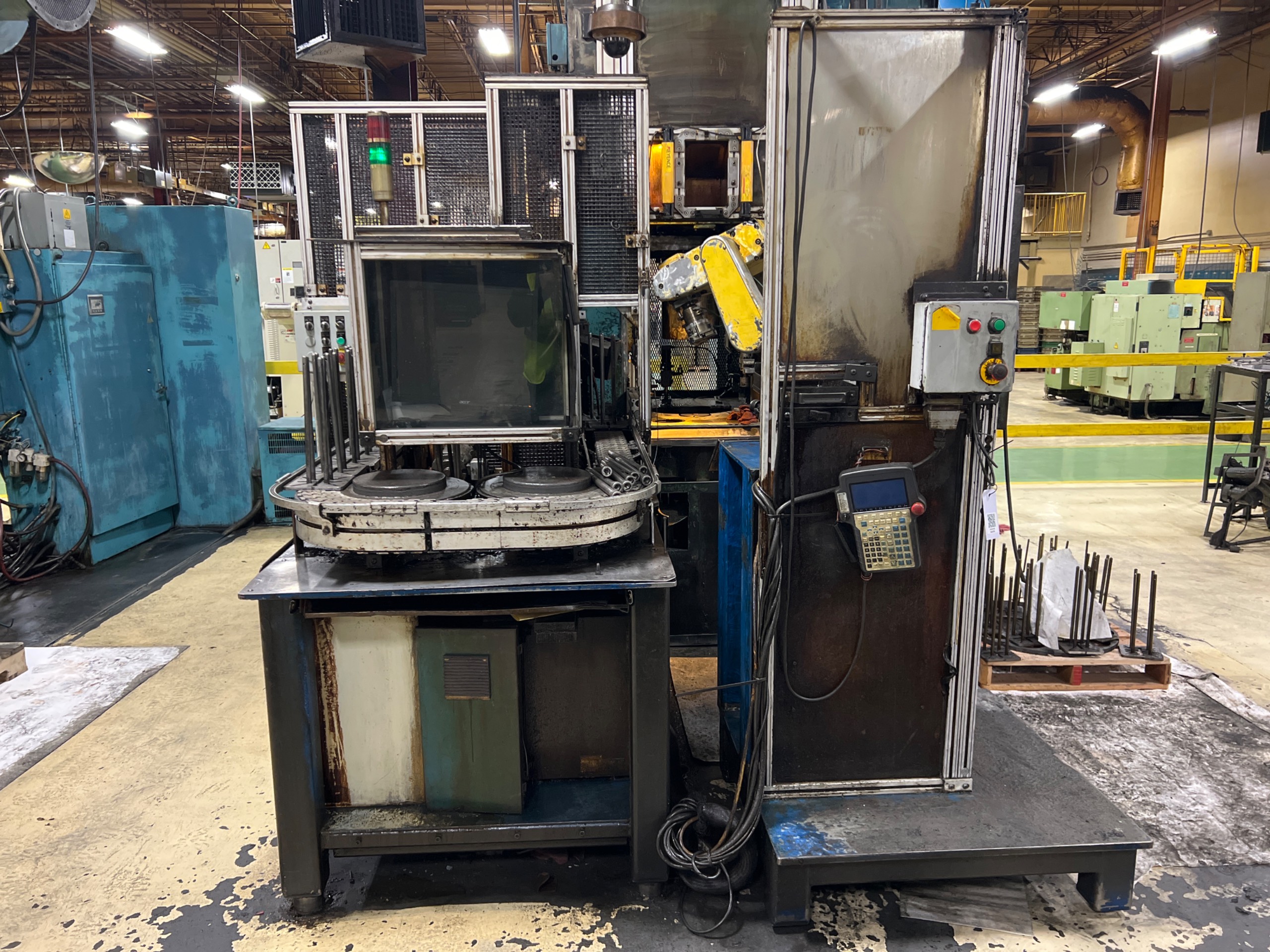 AUTOMATED PARTS LOADER WITH FANUC ROBOT