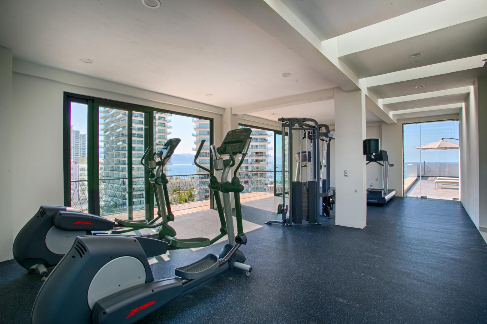 Spacious Condo Great for Families | Pools, Gym, Steps from Beach