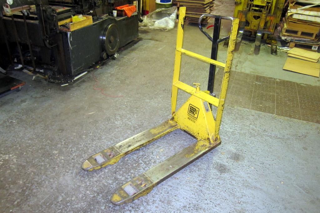 Lot #6: Pallet Mule 6000 LB Capacity Pallet Jack - WireBids