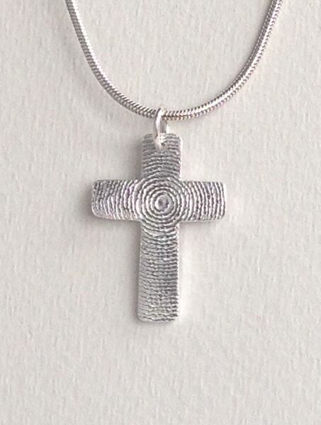 radiating cross - silver