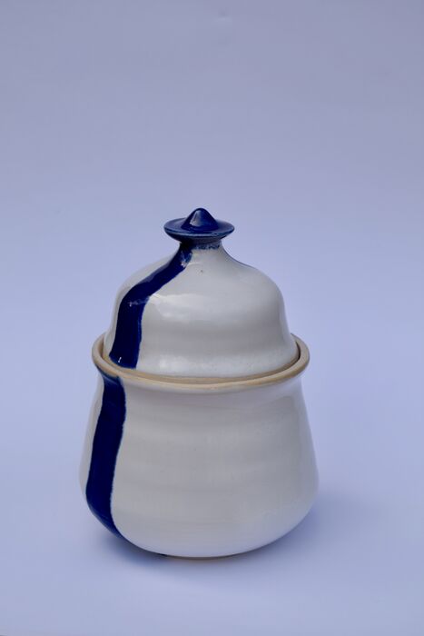 White glazed lidded pot with Blue Stripe