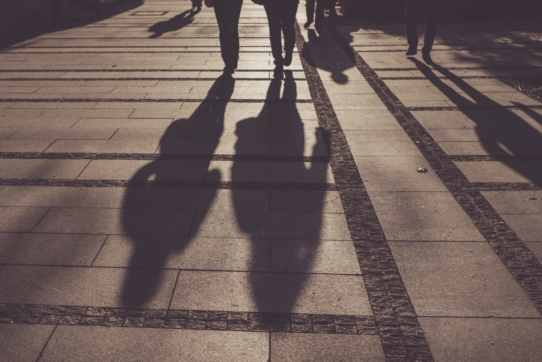 Silhouettes of people walking on city street – Hartsville Pike Church ...