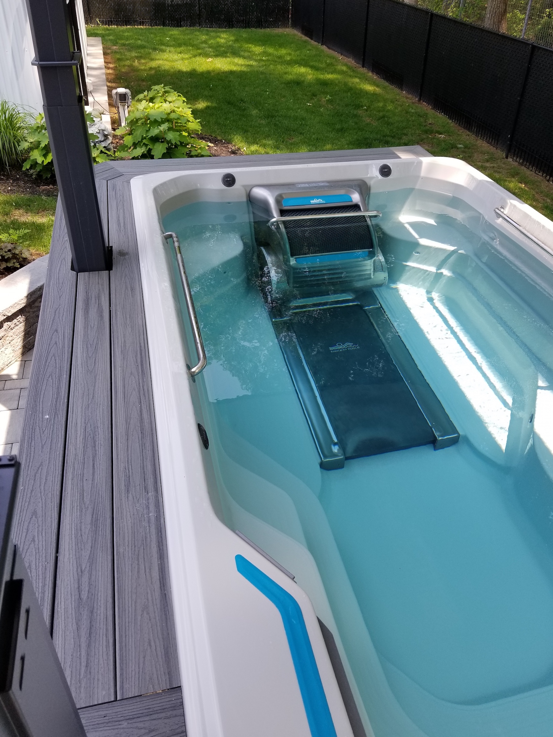 Backyard Spotlight: Swim Spa + Covana in a custom deck - Learning Center