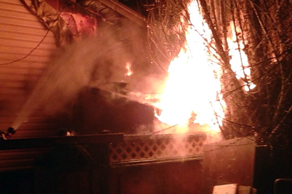 Shed and exterior of home damaged in early morning fire