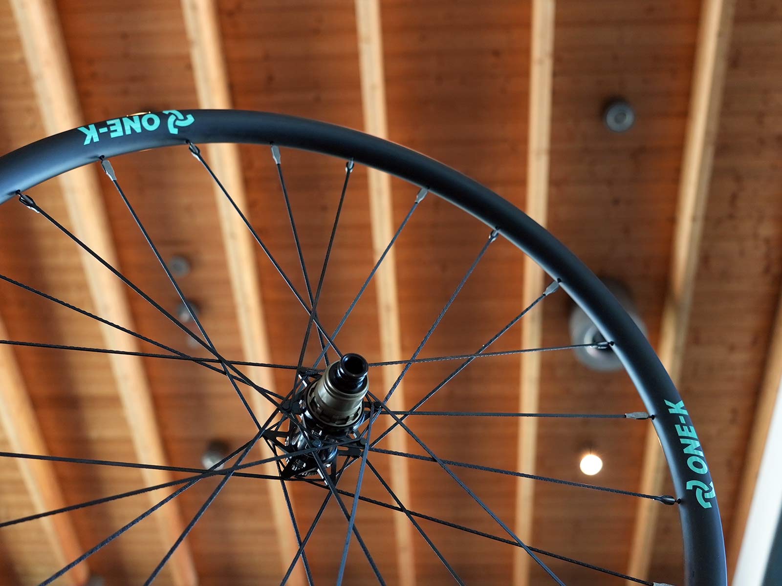 One K Wheels show 930g road wheelset with carbon fiber spoke system ...