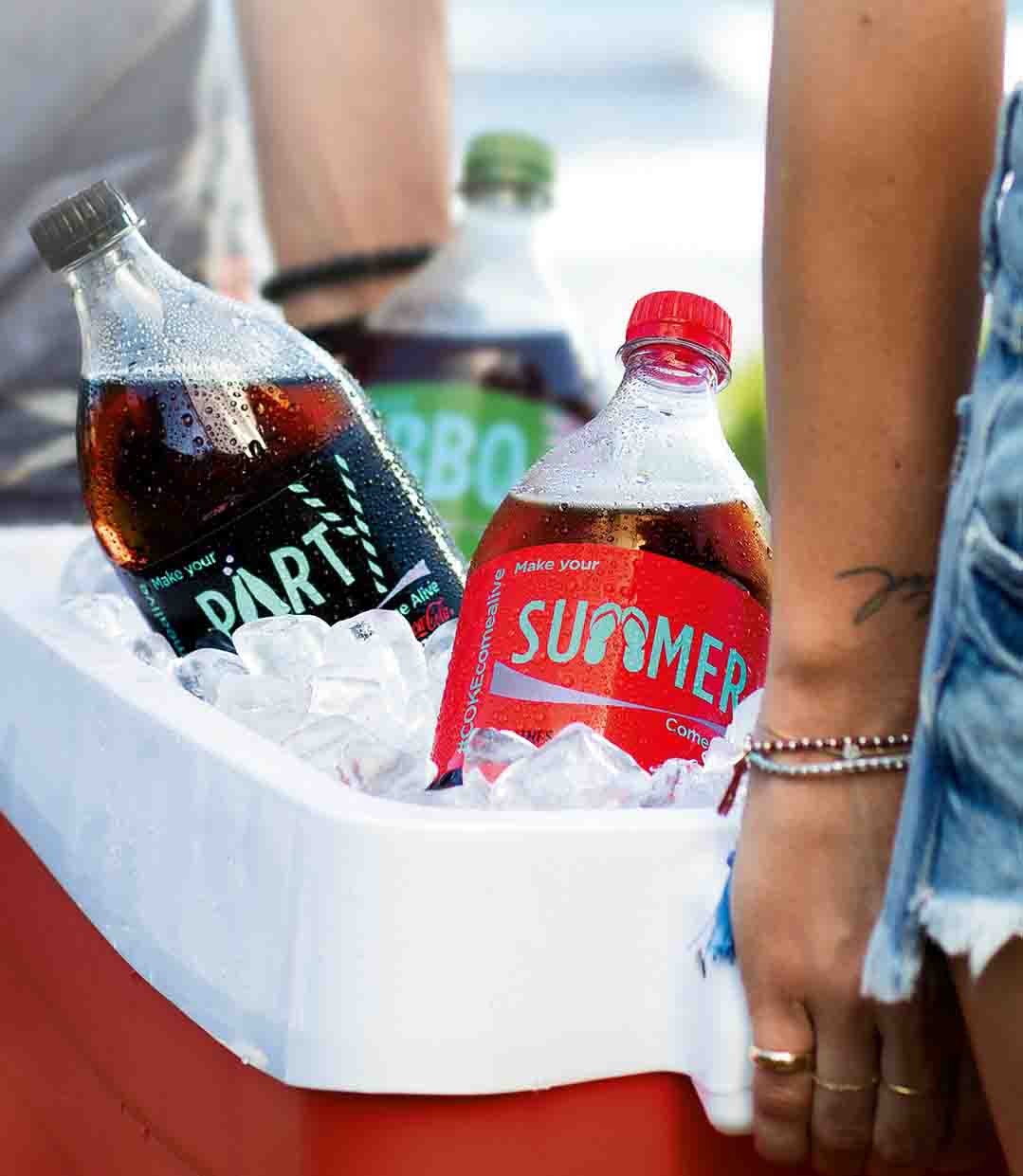 Coca-Cola bottle celebrates 100 years and changes colours for summer ...