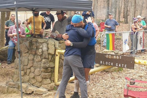 Ihor Verys - 2024 Barkley Marathons winner - Jodi Isenor hug at finish ...