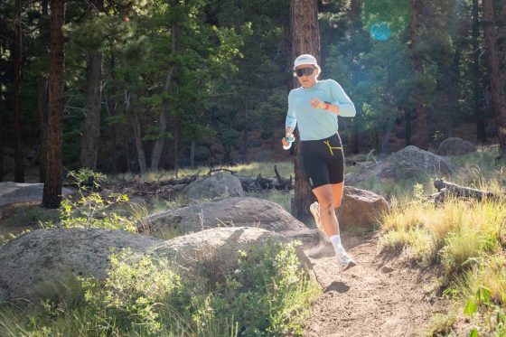Lotti Brinks - running in forest – iRunFar