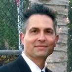 Brett Baker - President